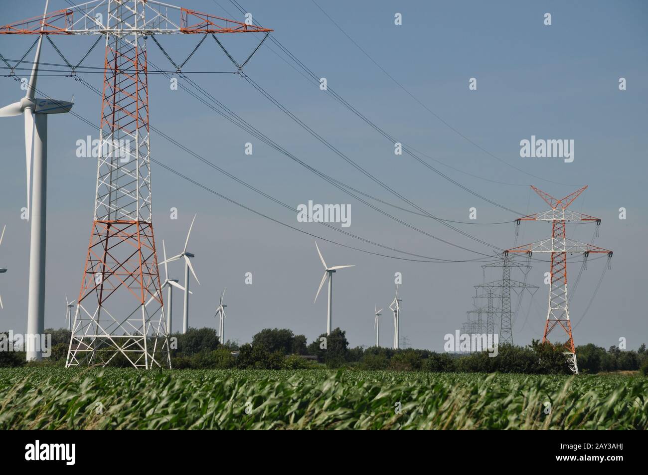 Wind turbines and high-voltage power lines Stock Photo - Alamy