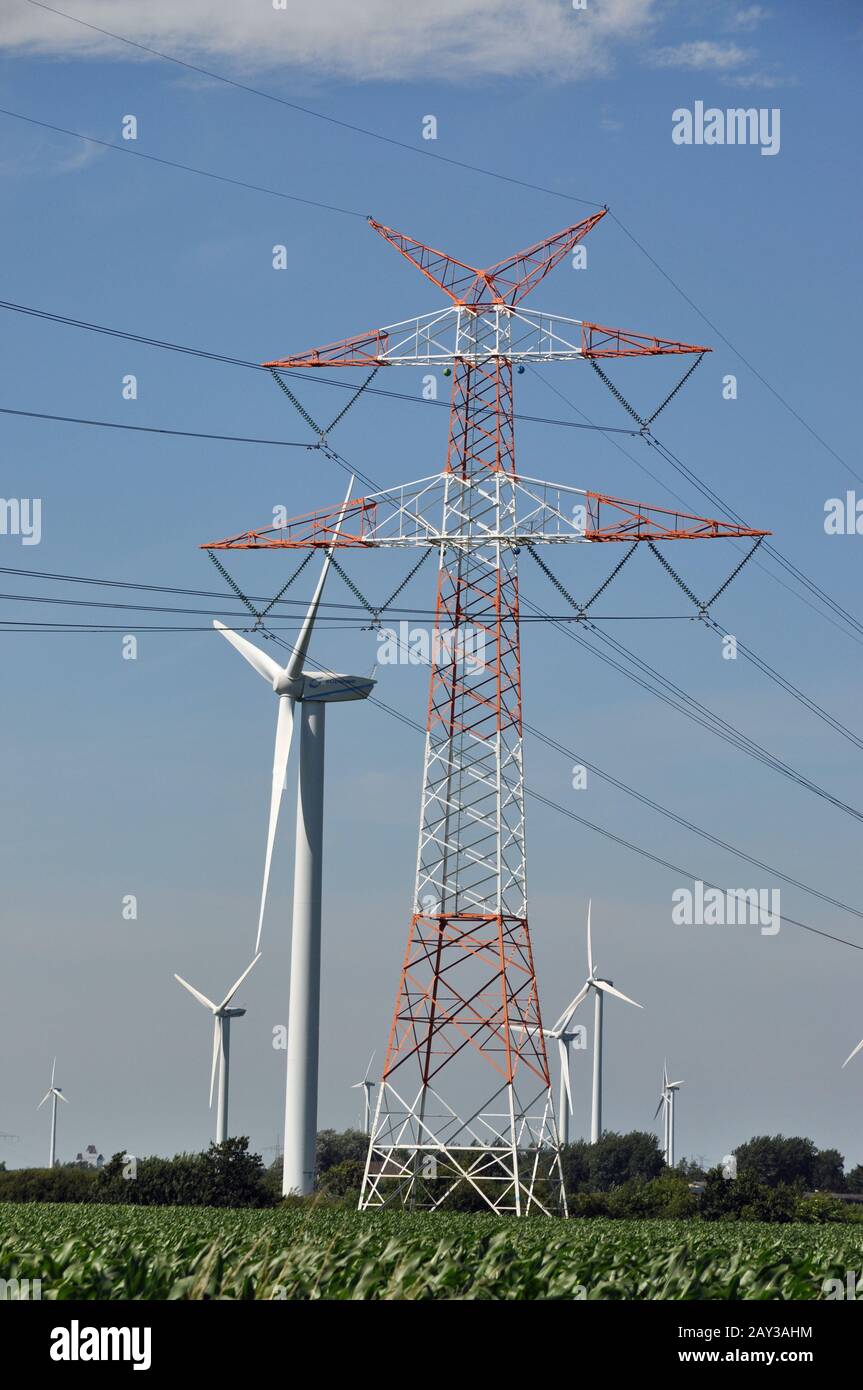 Wind turbines and high-voltage power lines Stock Photo - Alamy
