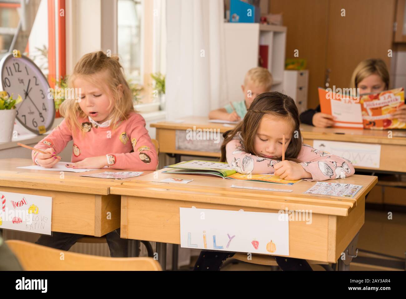 Girls in classroom Stock Photo - Alamy