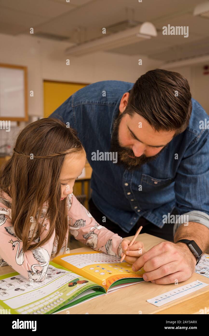 School girl and teacher hi-res stock photography and images - Alamy