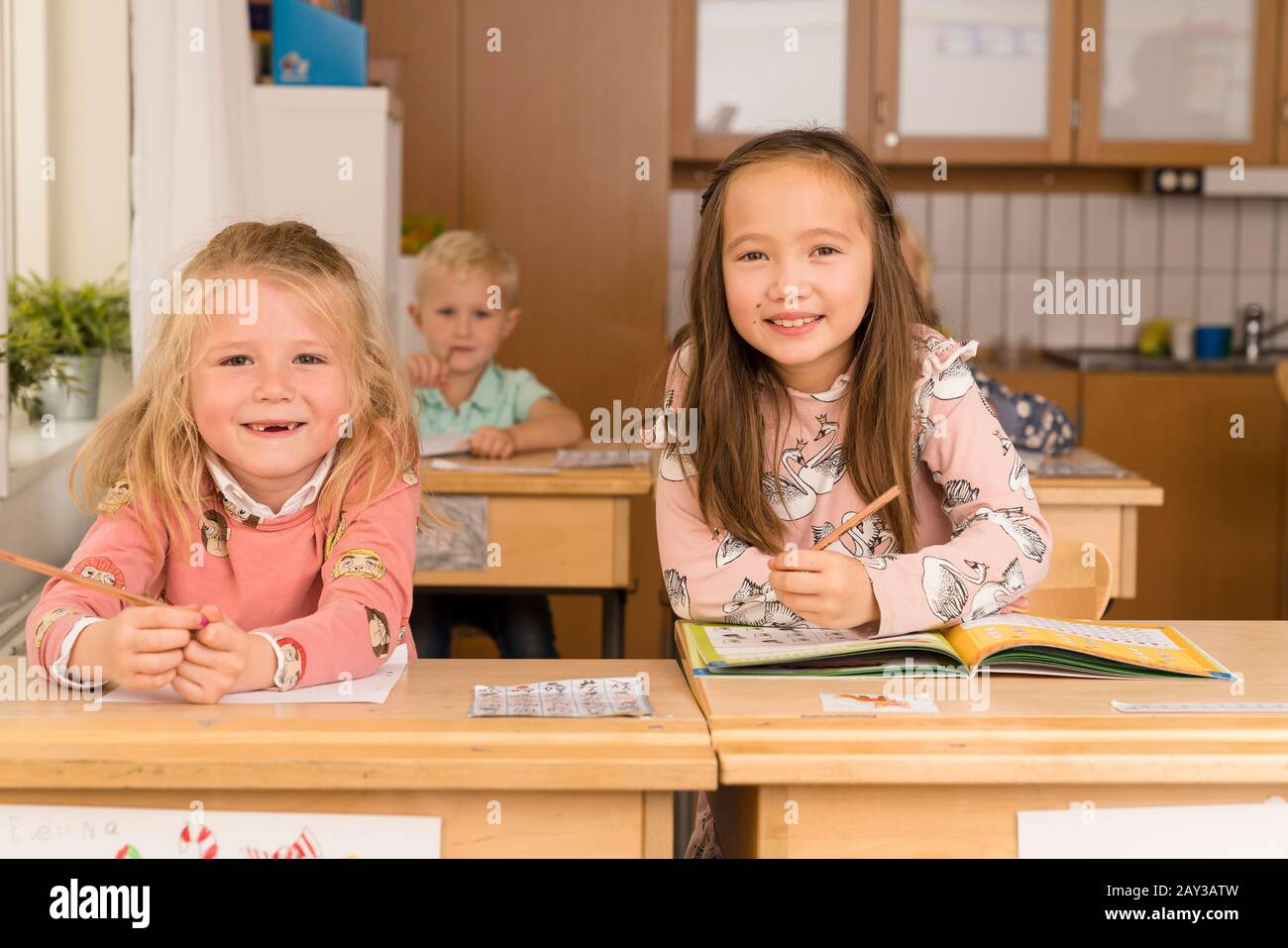 Girls in classroom Stock Photo - Alamy