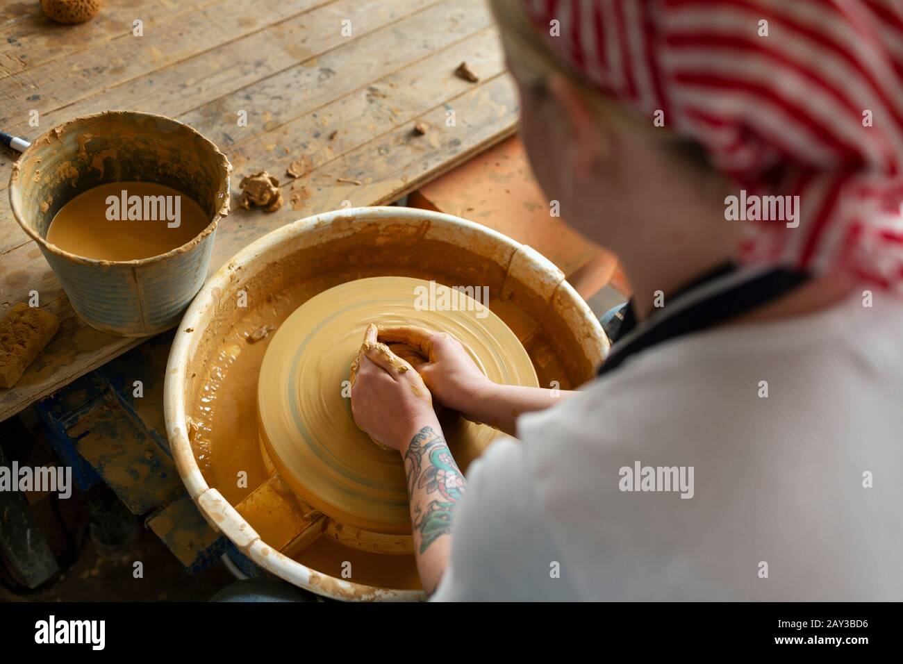 Woman making pottery Stock Photo - Alamy
