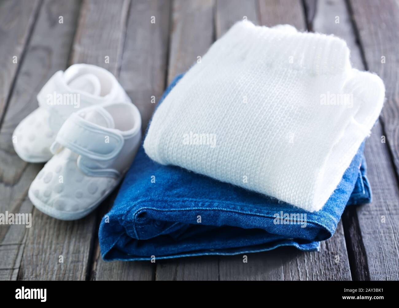 Baby blue cardigan hi-res stock photography and images - Alamy