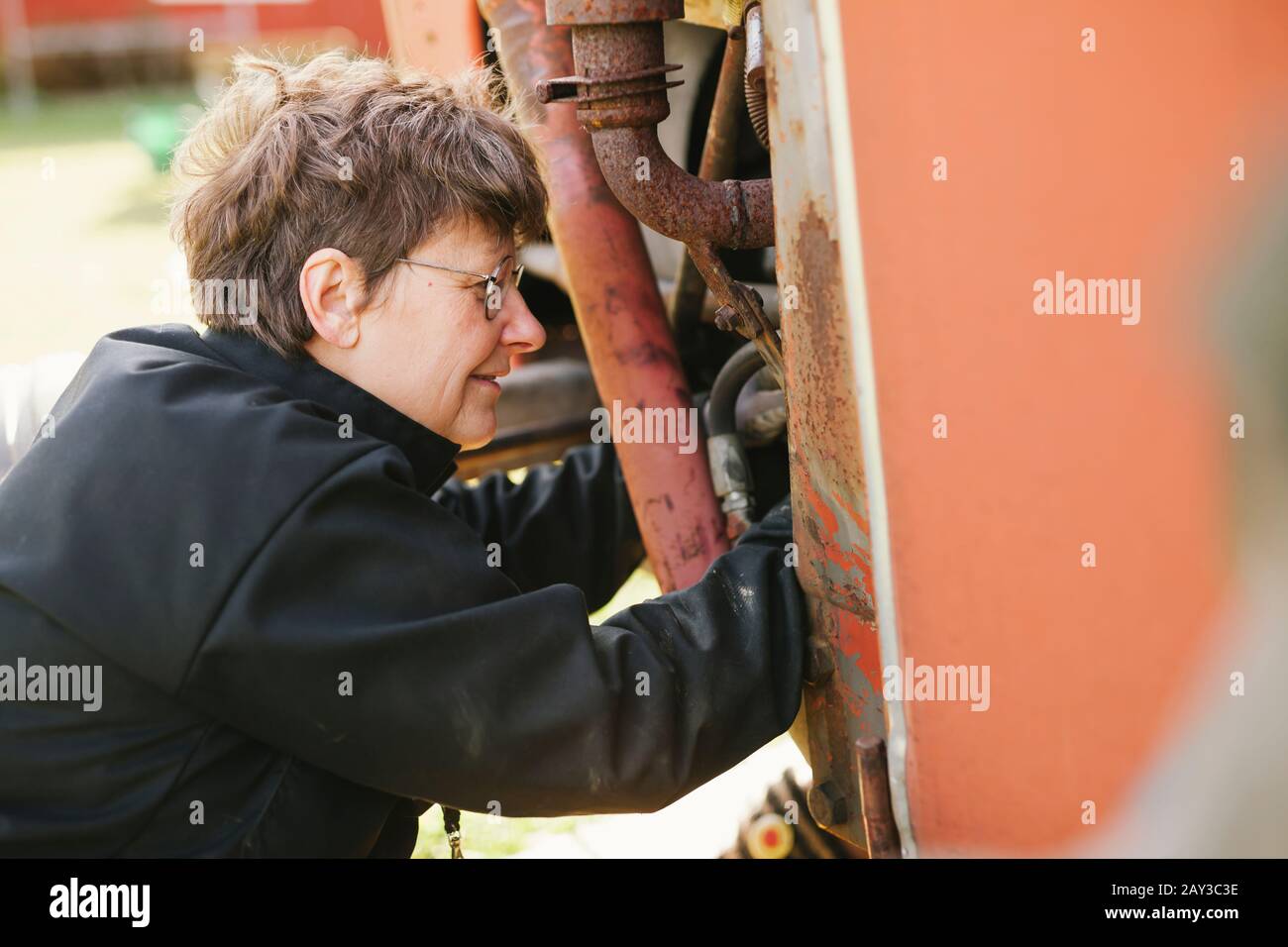 Repairing tractor hi-res stock photography and images - Alamy