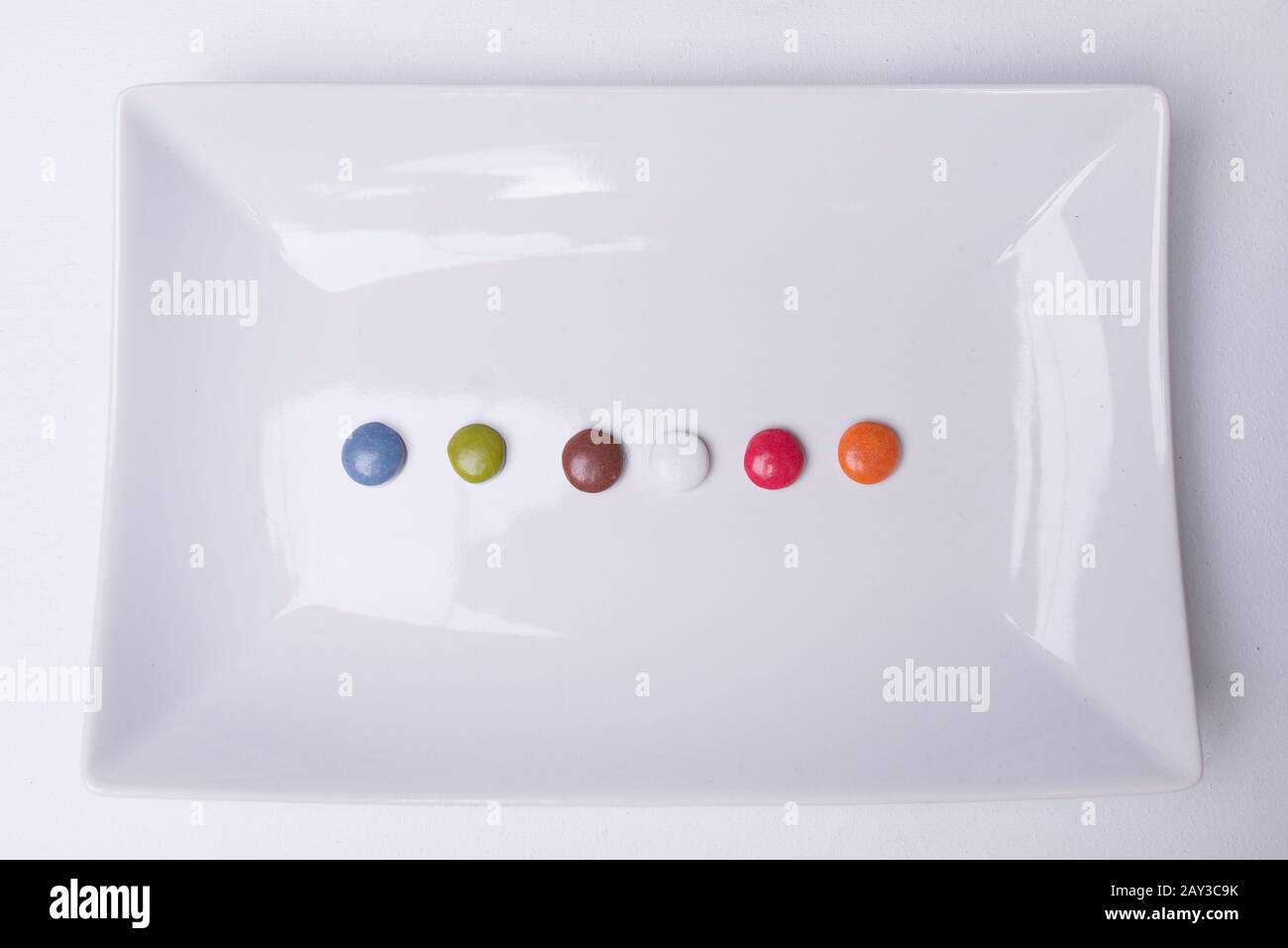 Pills and candies Stock Photo - Alamy