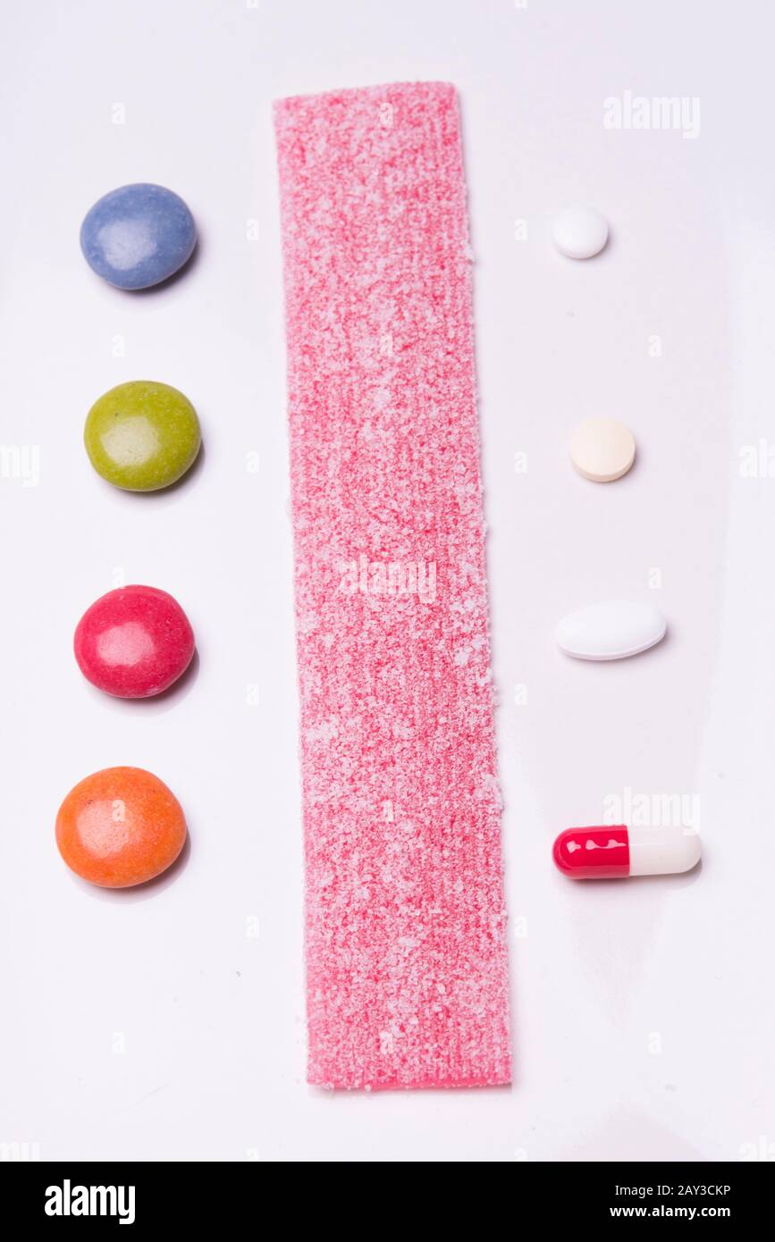 Pills and candies Stock Photo - Alamy