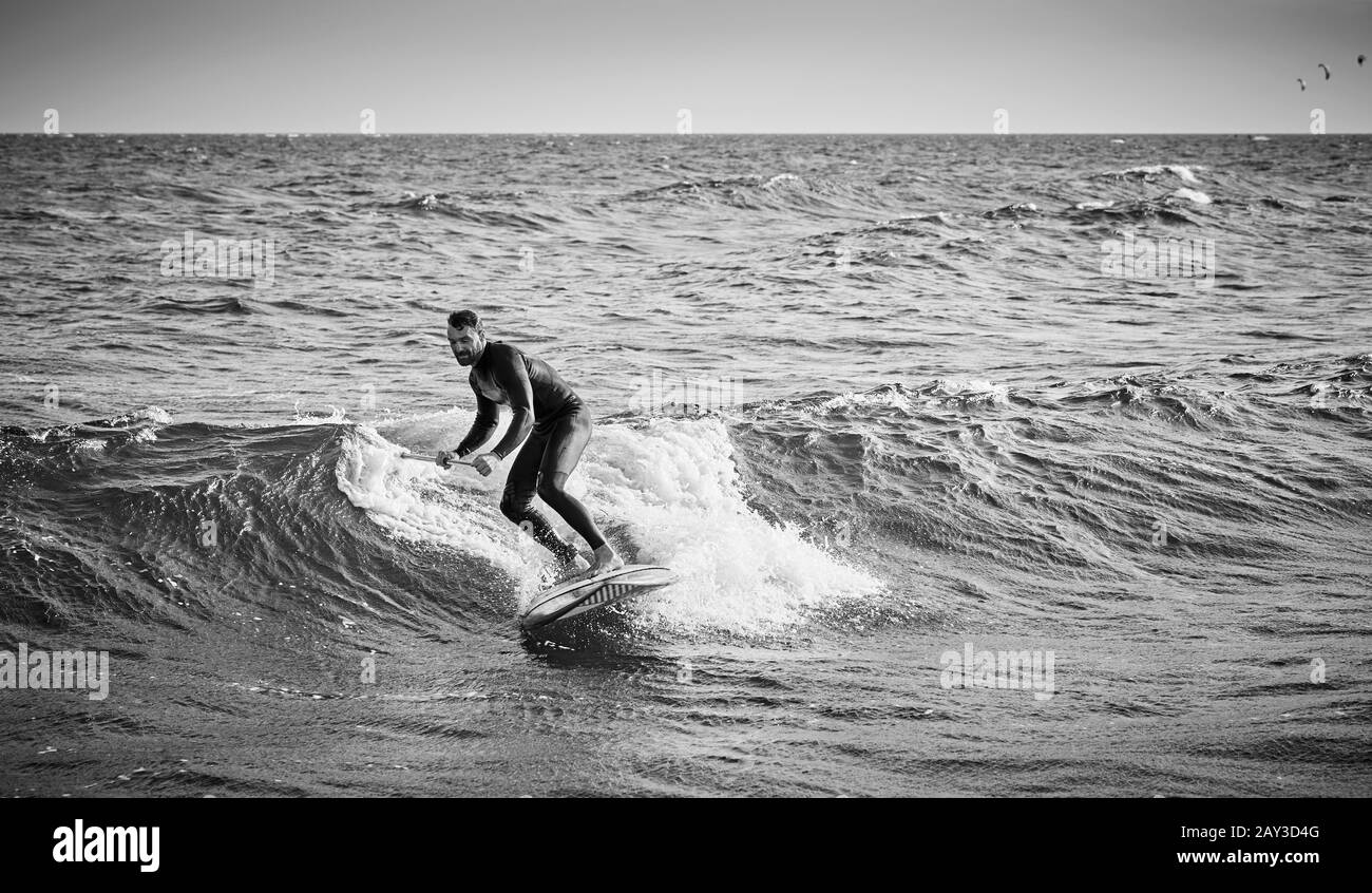 Man waves hi-res stock photography and images - Alamy
