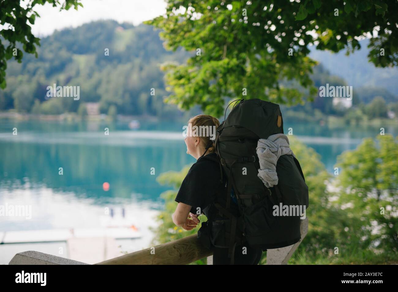 Young woman backpacker standing hi-res stock photography and images - Alamy