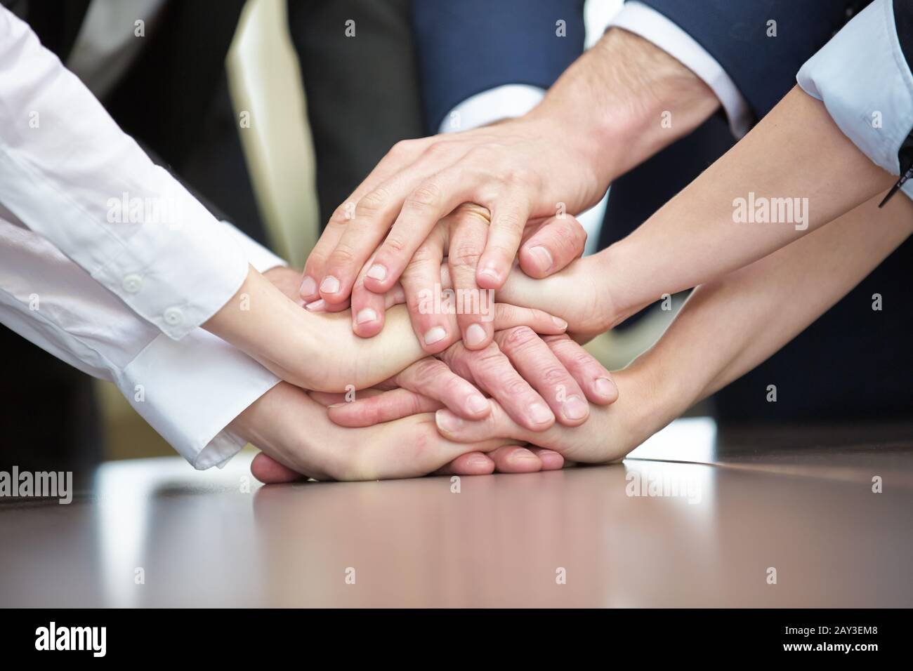 Group many hands team motivation hi-res stock photography and images ...