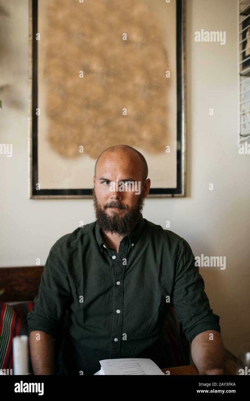 Serious looking bald man hi-res stock photography and images - Alamy