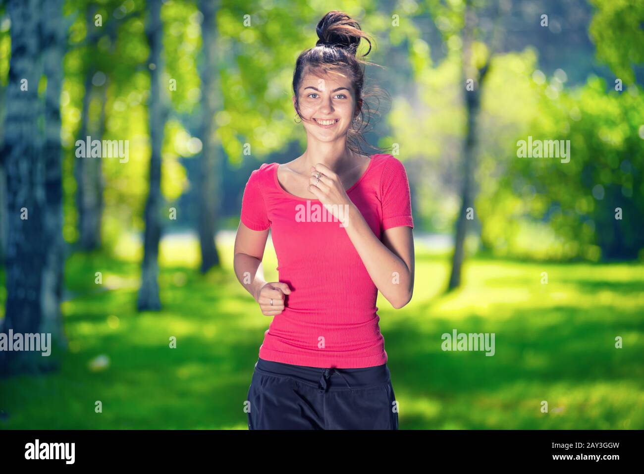 Runner running in park hi-res stock photography and images - Alamy