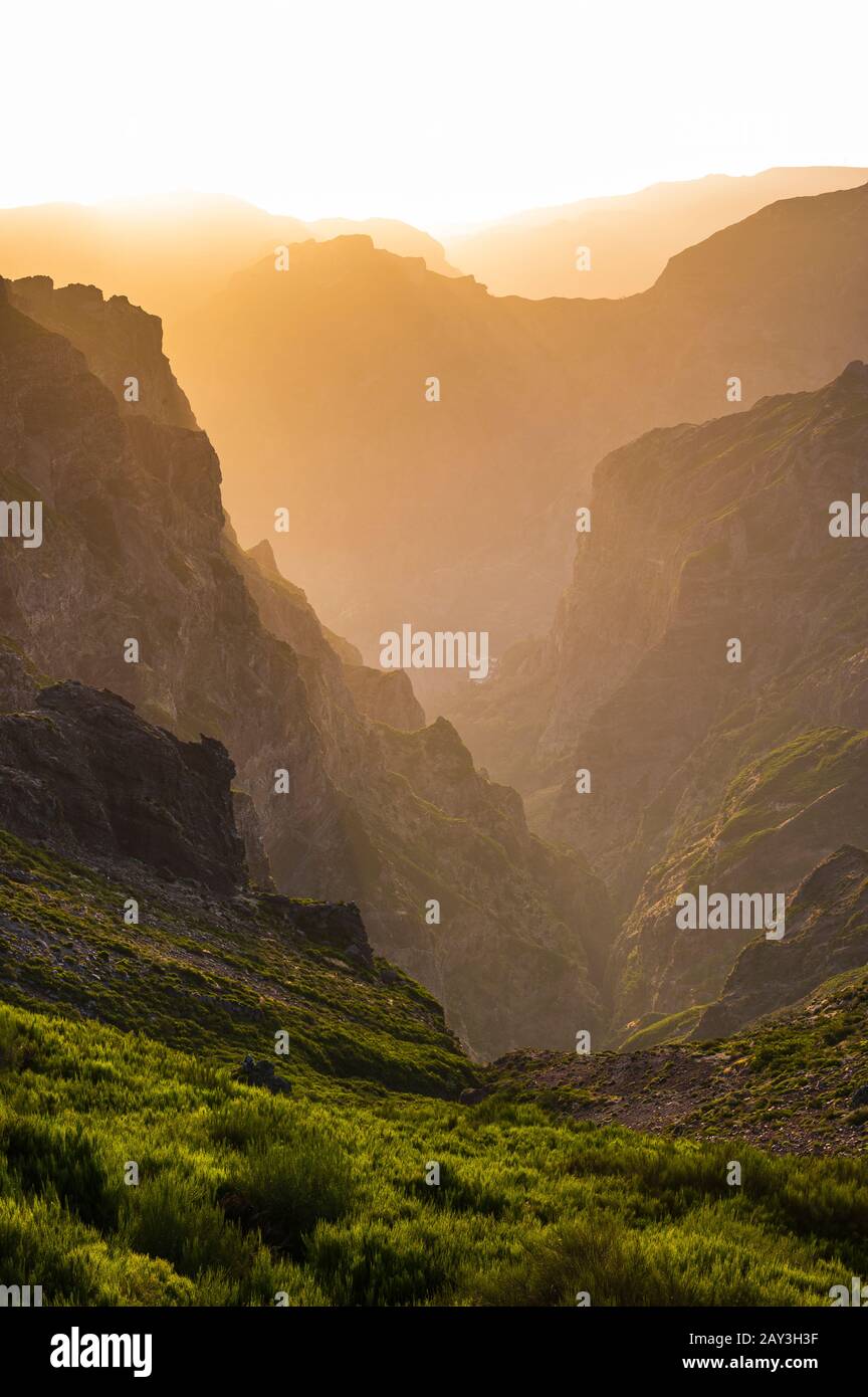 Mountain valley at sunset Stock Photo - Alamy