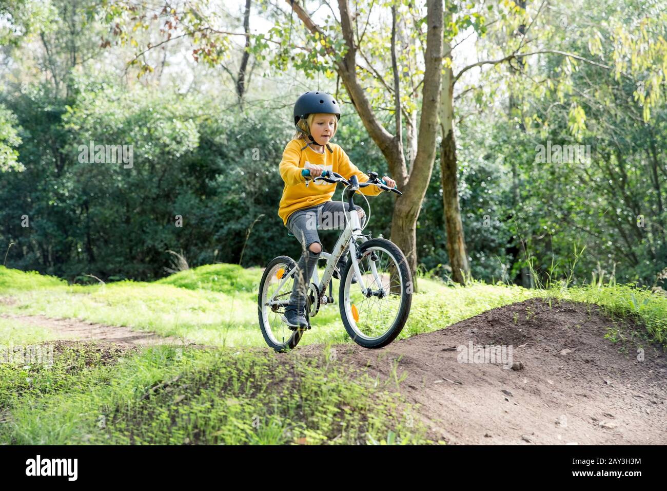 Girl cycling at summer Stock Photo - Alamy