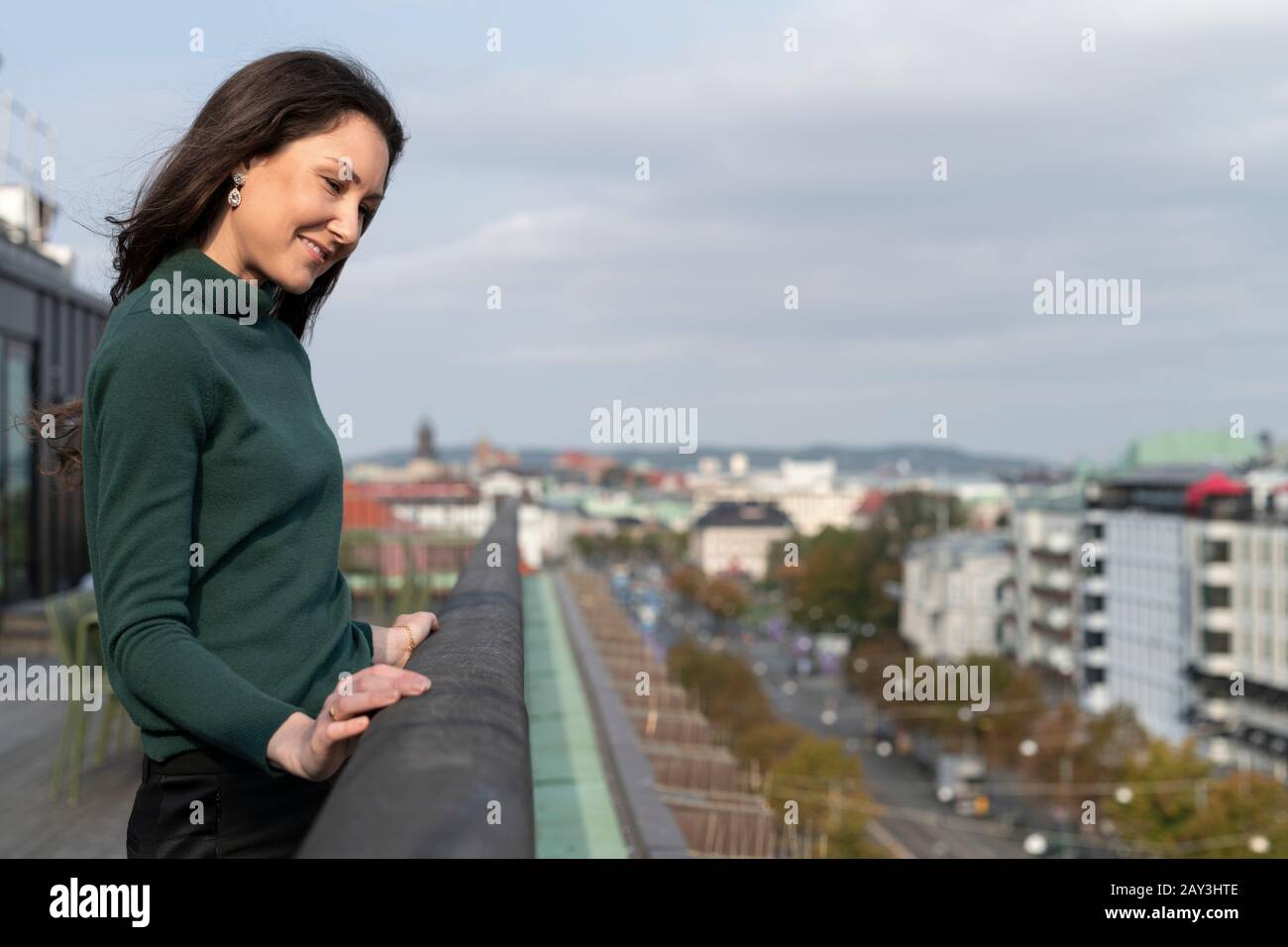 People balcony hi-res stock photography and images - Alamy