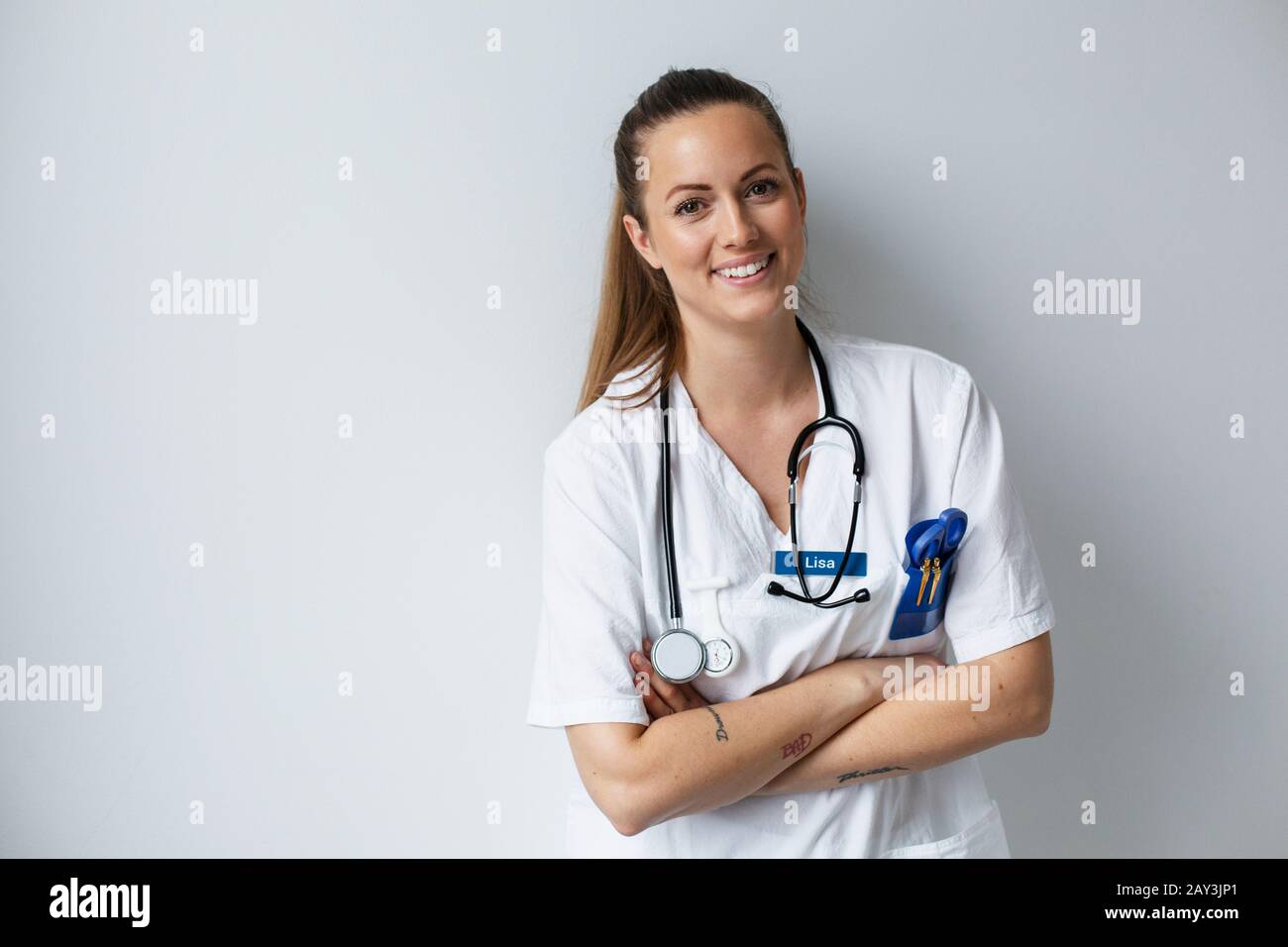 Nurse looking at camera Stock Photo - Alamy