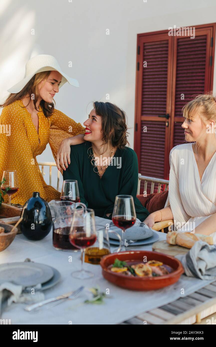 Happy female friends together Stock Photo - Alamy