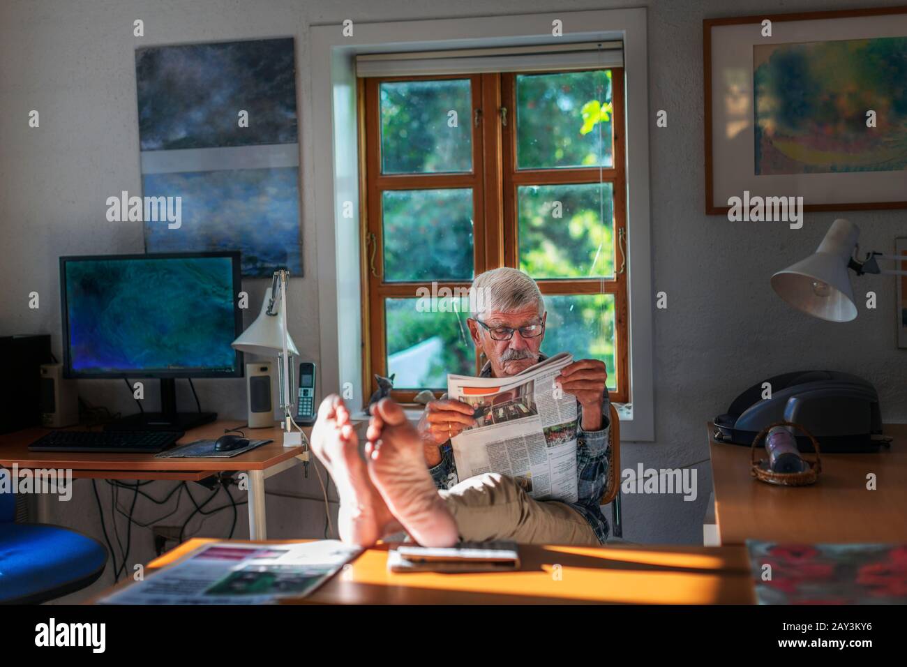 Rural people reading hi-res stock photography and images - Alamy