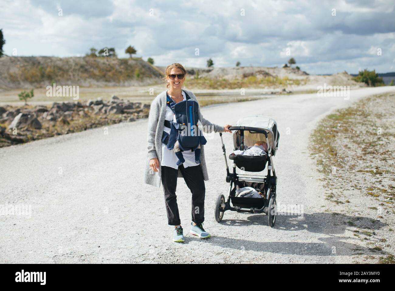 Woman with pram hi-res stock photography and images - Alamy