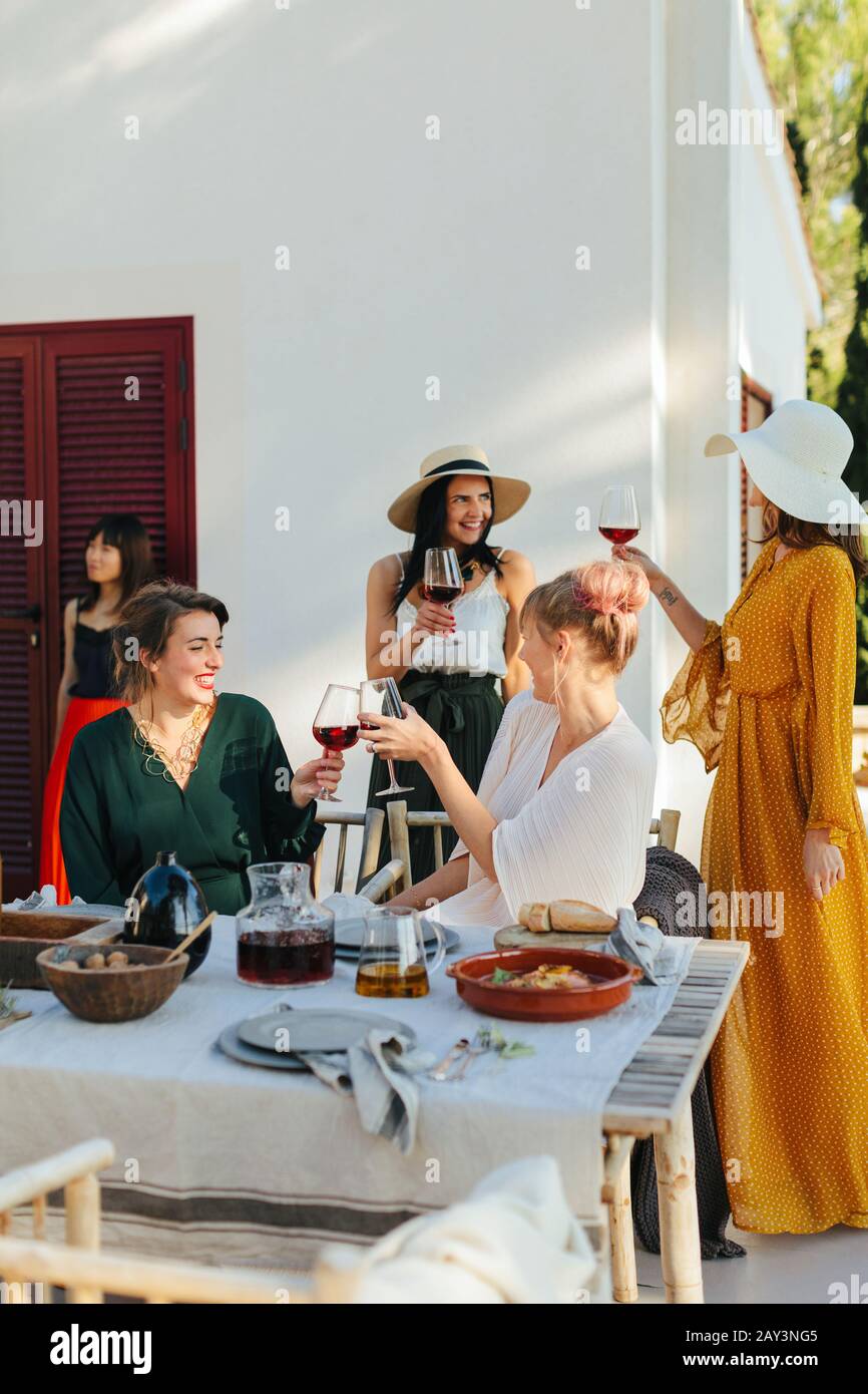 Happy female friends together Stock Photo - Alamy