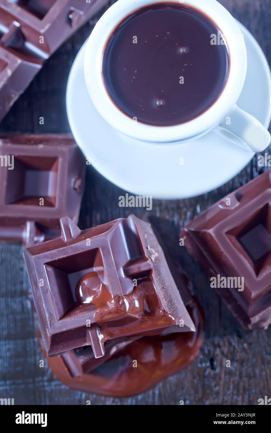 Falling milk chocolate pieces hi-res stock photography and images - Alamy