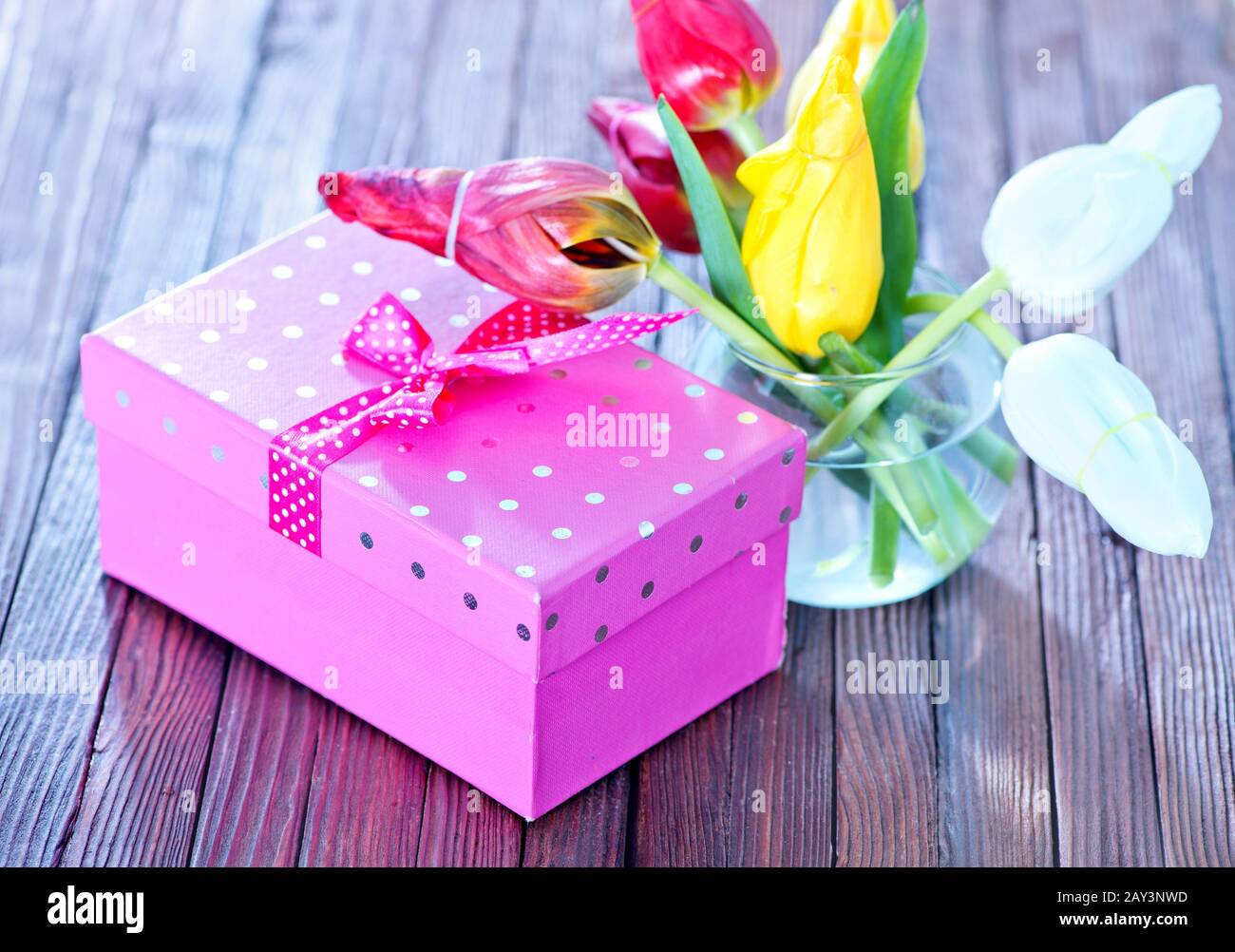 flowers and present Stock Photo - Alamy