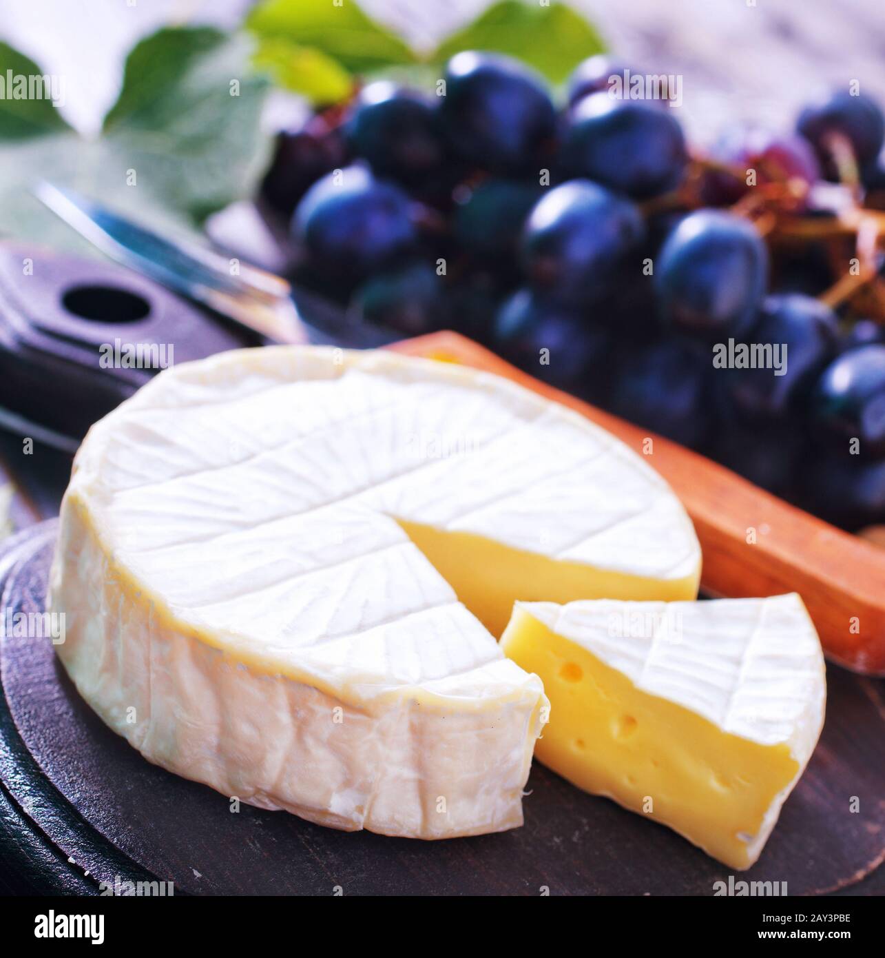 White mould full fat soft cheese hi-res stock photography and images ...
