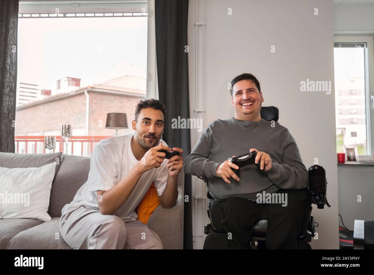 Men playing video games Stock Photo - Alamy