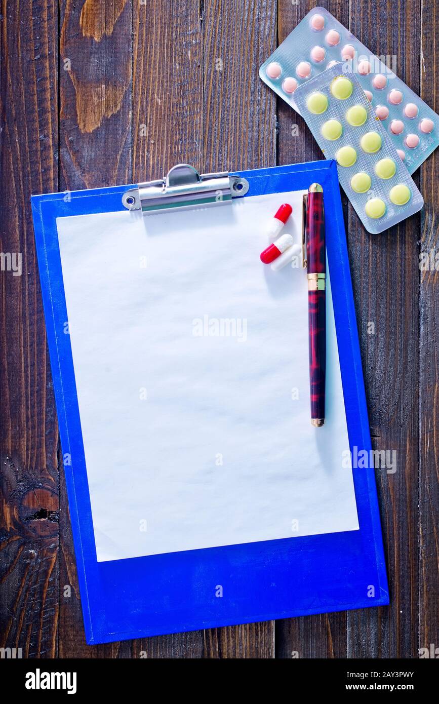 note and pills Stock Photo - Alamy