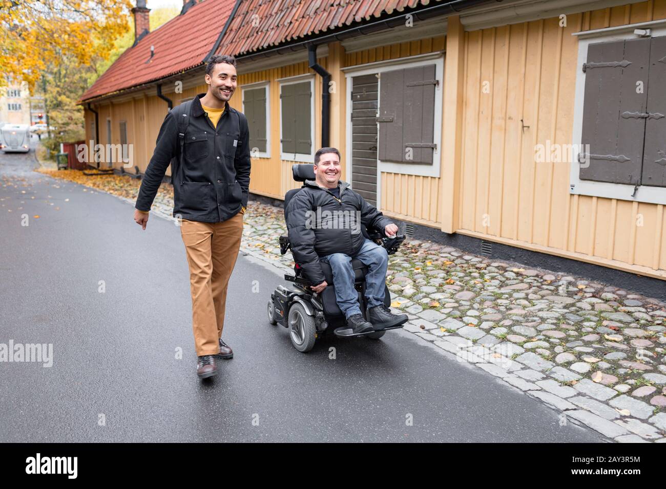 Men walking together hi-res stock photography and images - Alamy