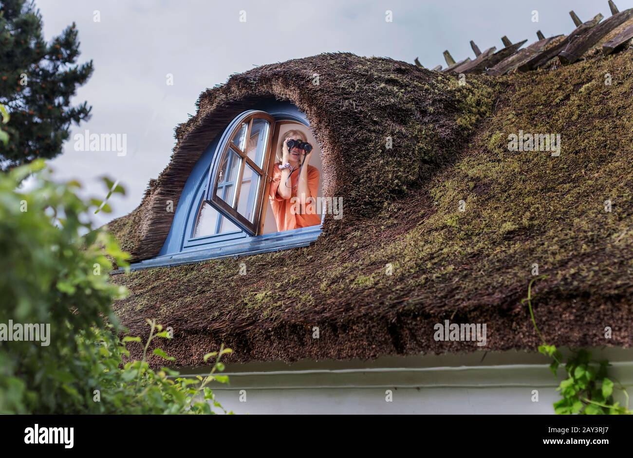 Binoculars looking through window hi-res stock photography and images ...