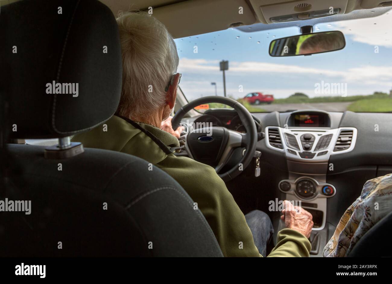 Senior man driving car traffic hi-res stock photography and images - Alamy