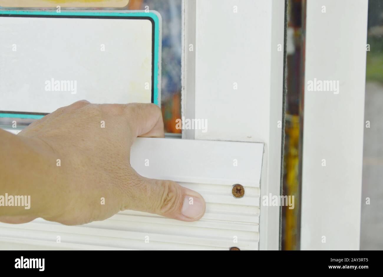 hand pushing grocery shop door to opened Stock Photo - Alamy