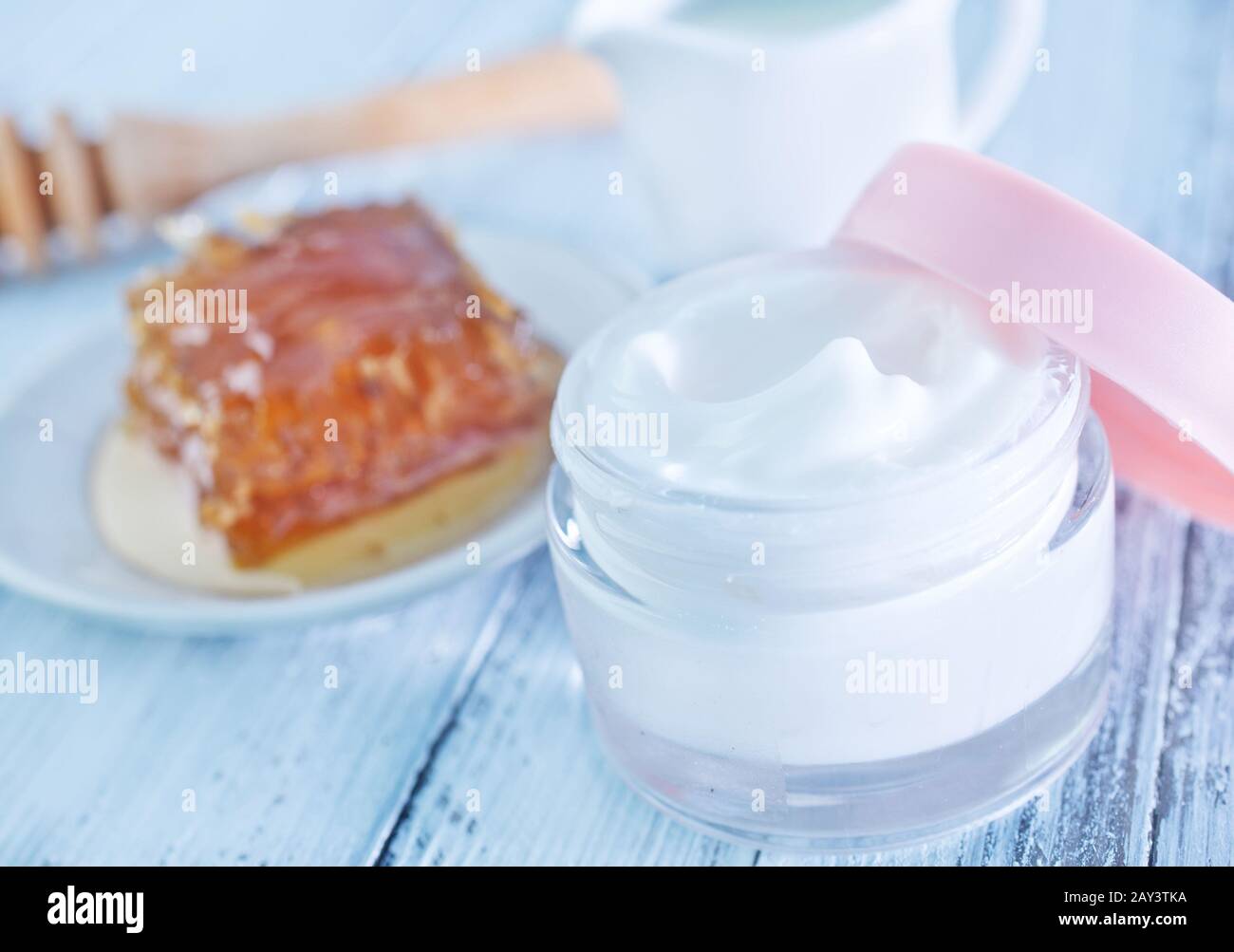 body lotion in glass bank and on a table Stock Photo - Alamy