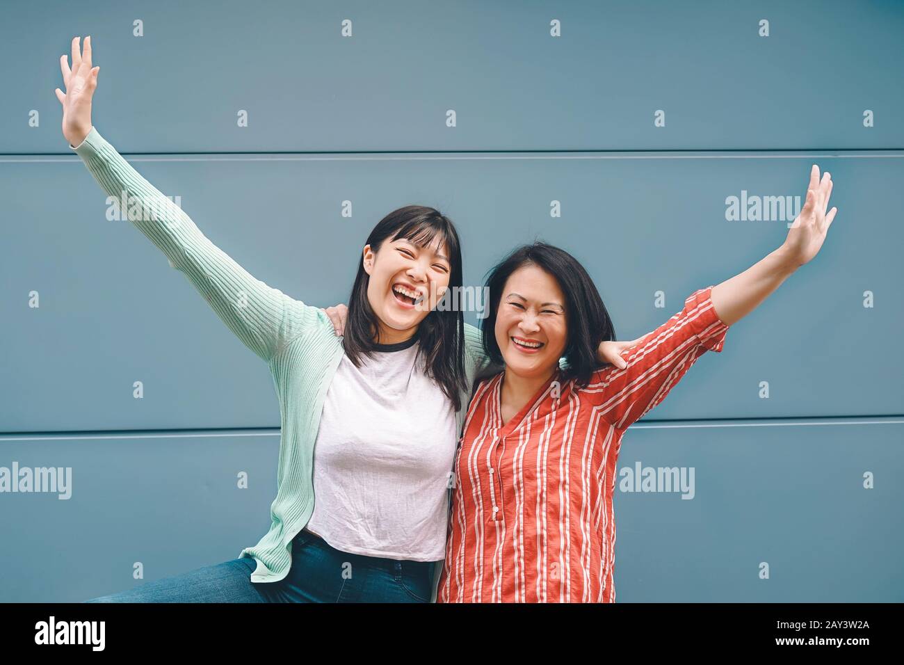 Happy Asian family having fun outdoor - Chinese mother and daughter ...