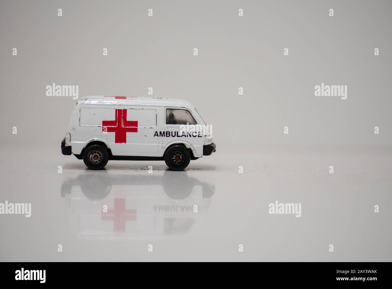 Toy ambulance with reflection on floor Stock Photo - Alamy