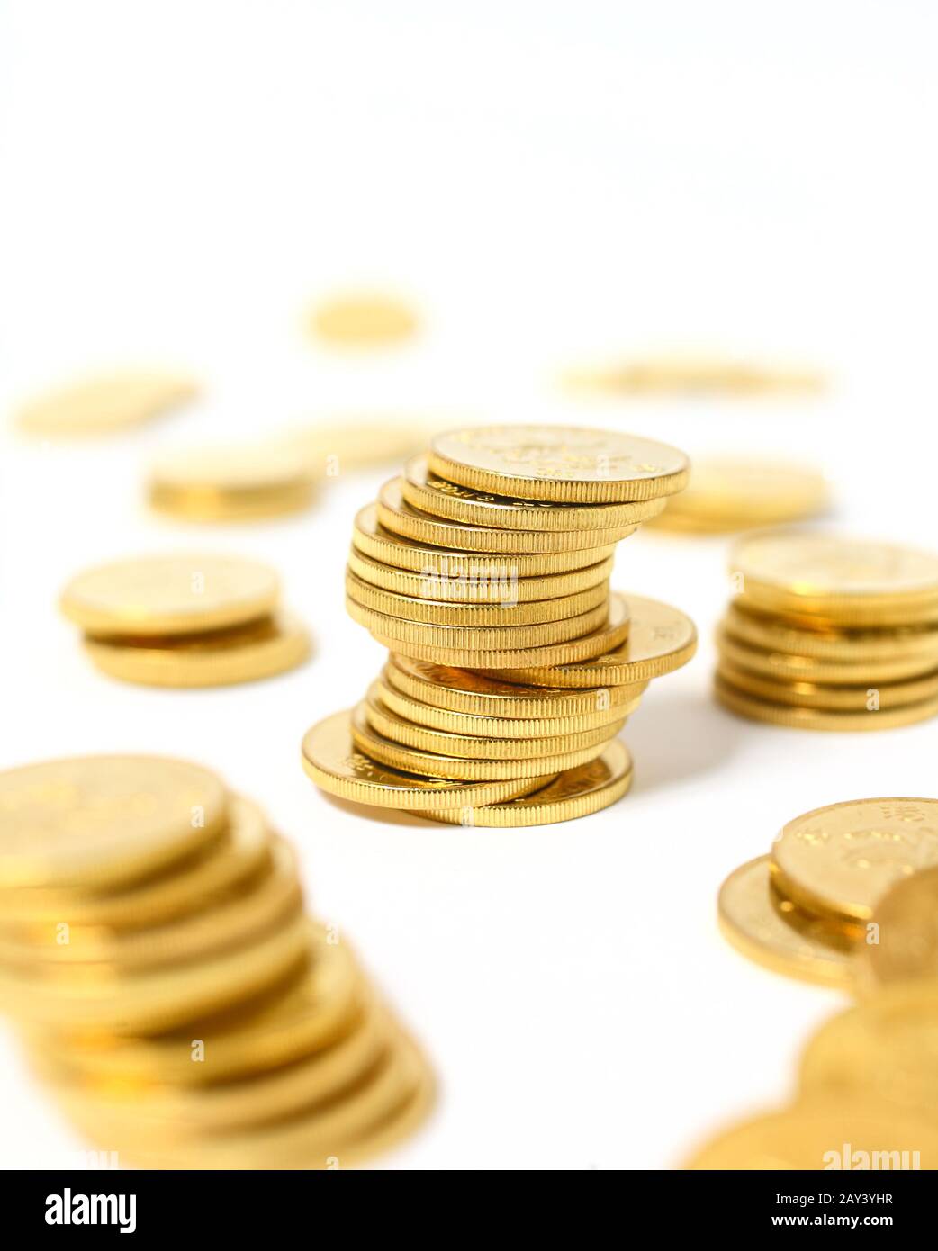 Coins in gold color Stock Photo - Alamy
