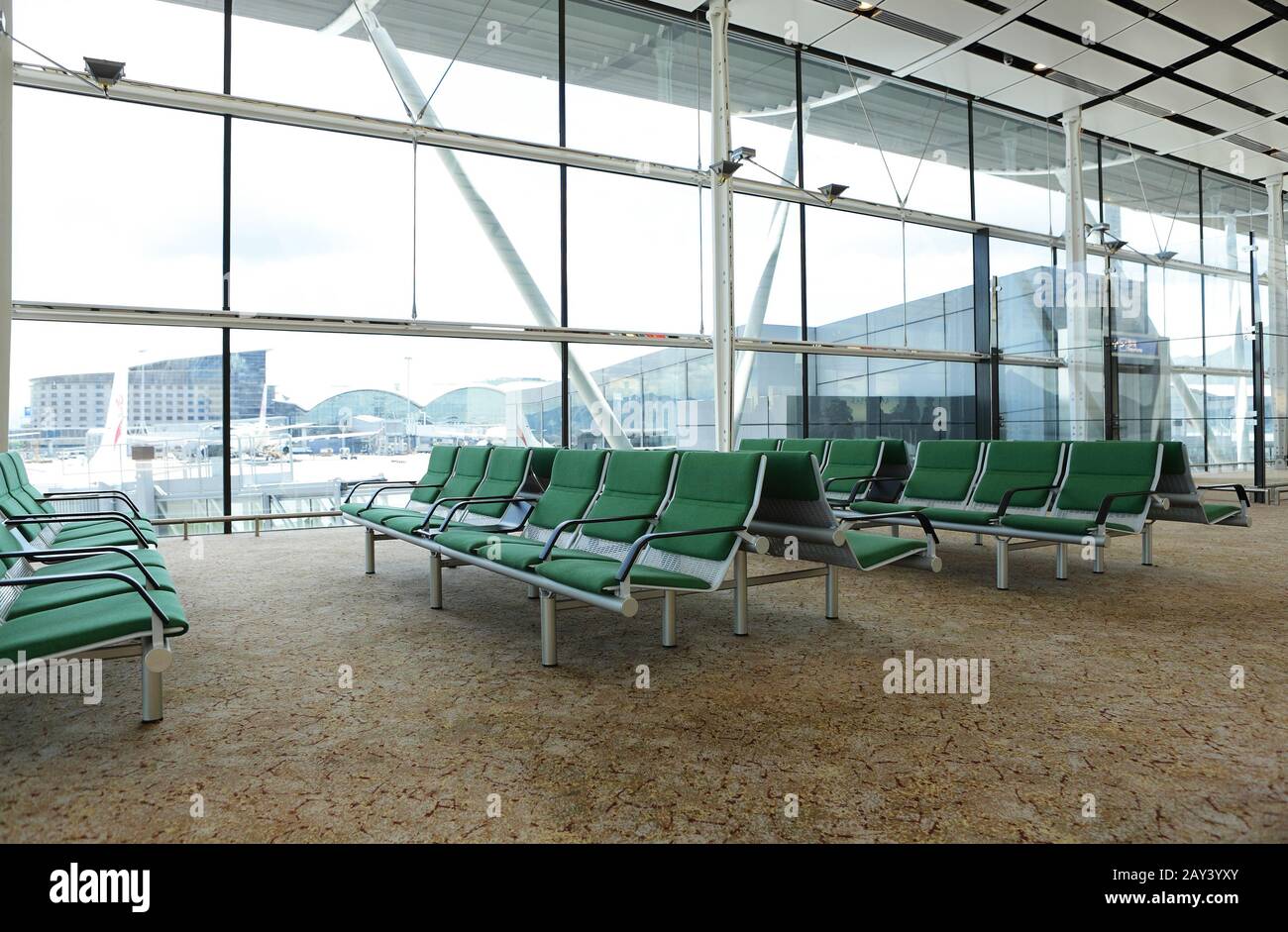 bench in waiting hall in airport Stock Photo - Alamy