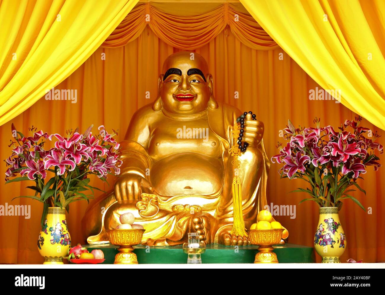 Fat gold buddha statue hi-res stock photography and images - Alamy