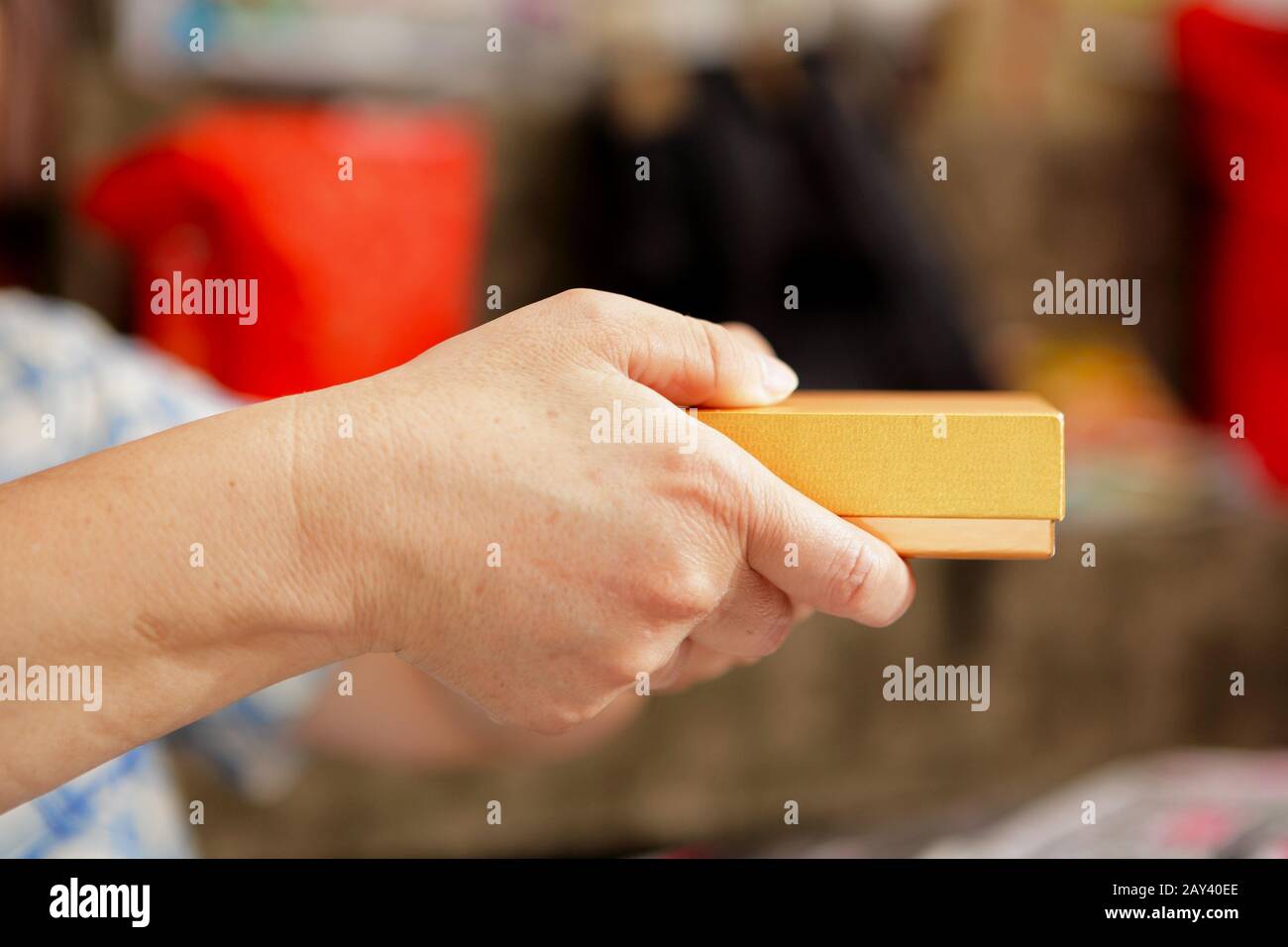 gift box on hand Stock Photo - Alamy