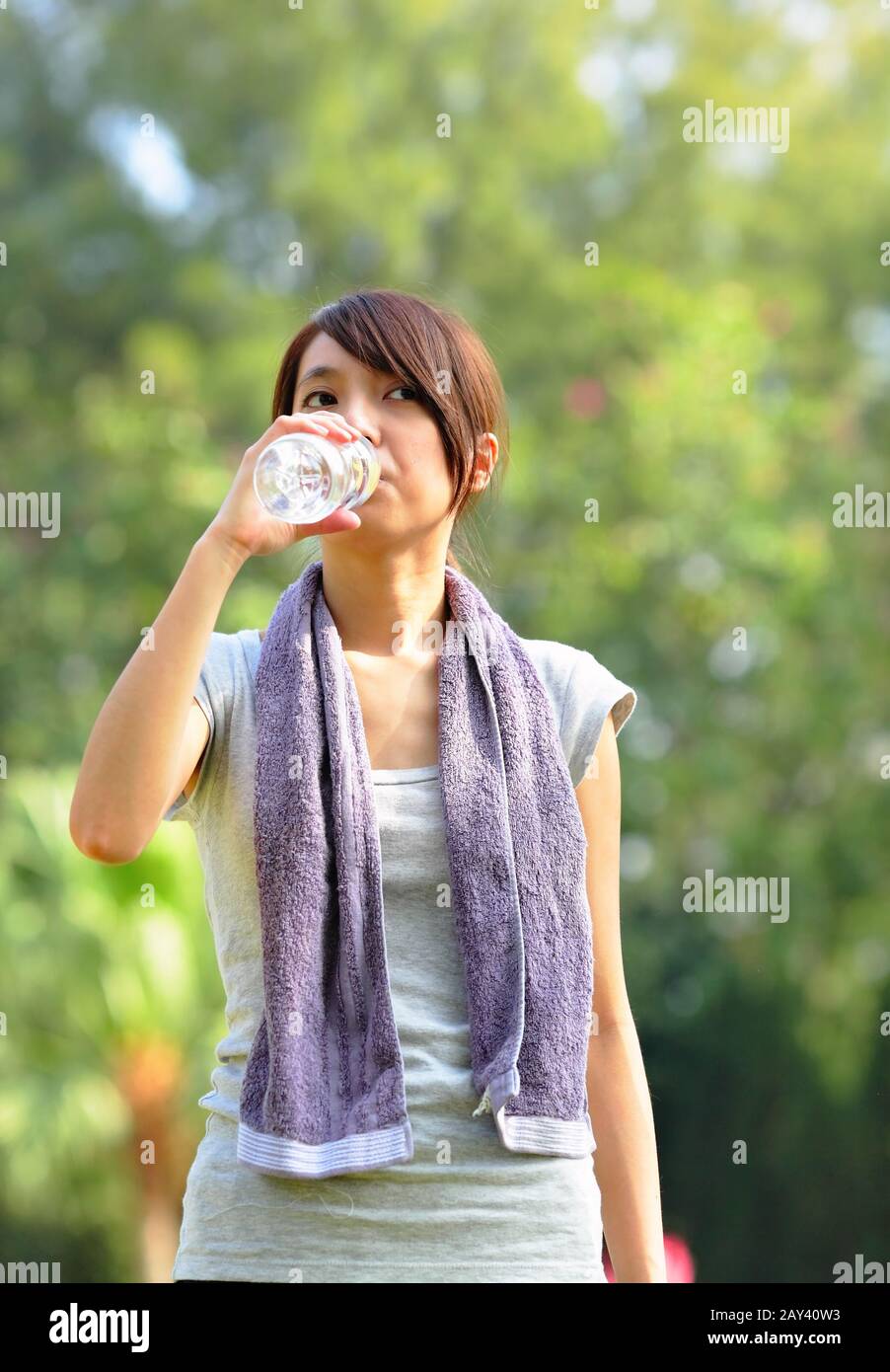 woman drink water after sport Stock Photo - Alamy