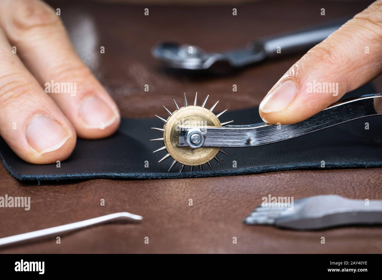 Cobbler Working With Leather. Leather Craft Tools Stock Photo - Alamy