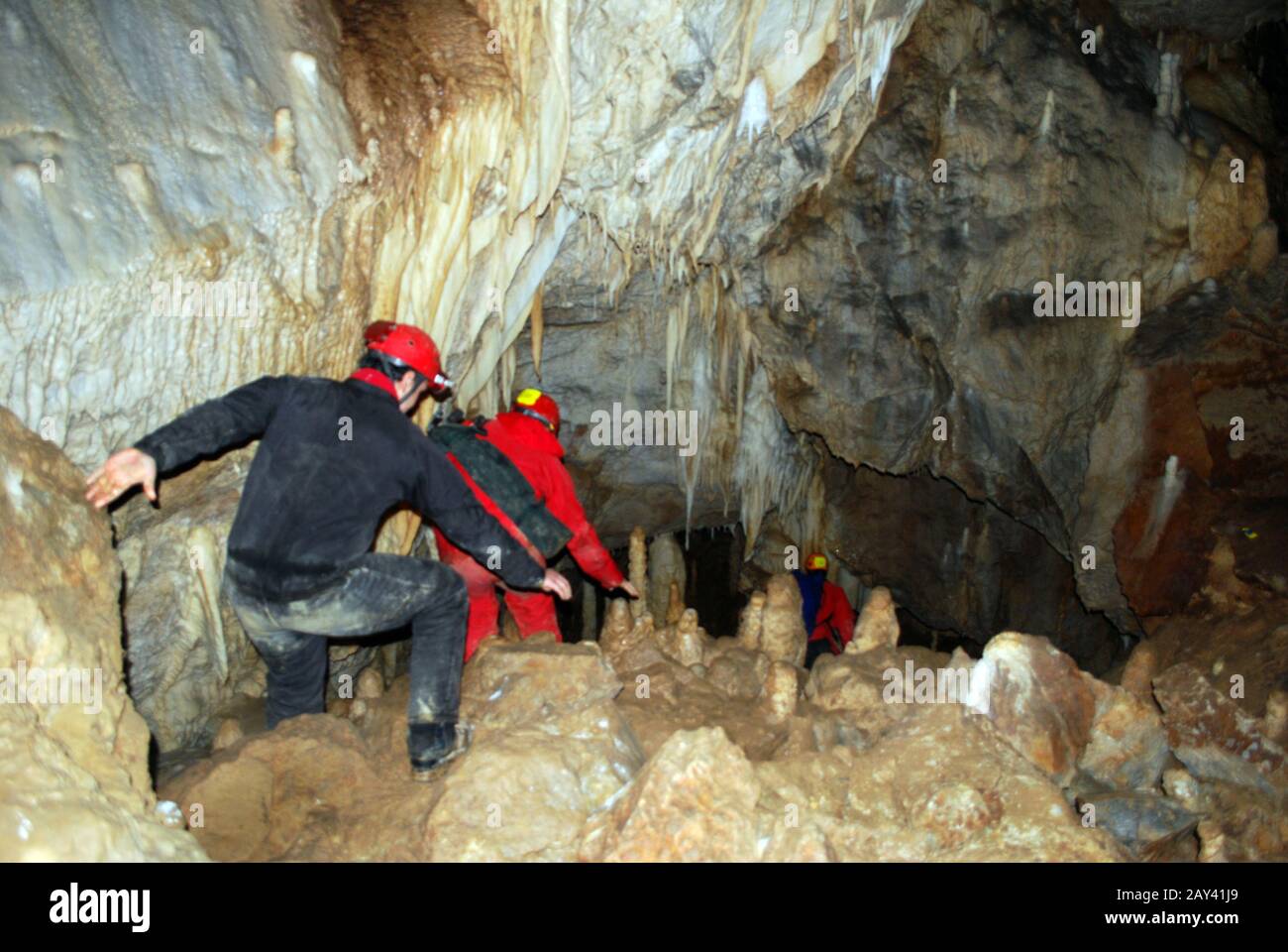 Man in cave Stock Photo - Alamy