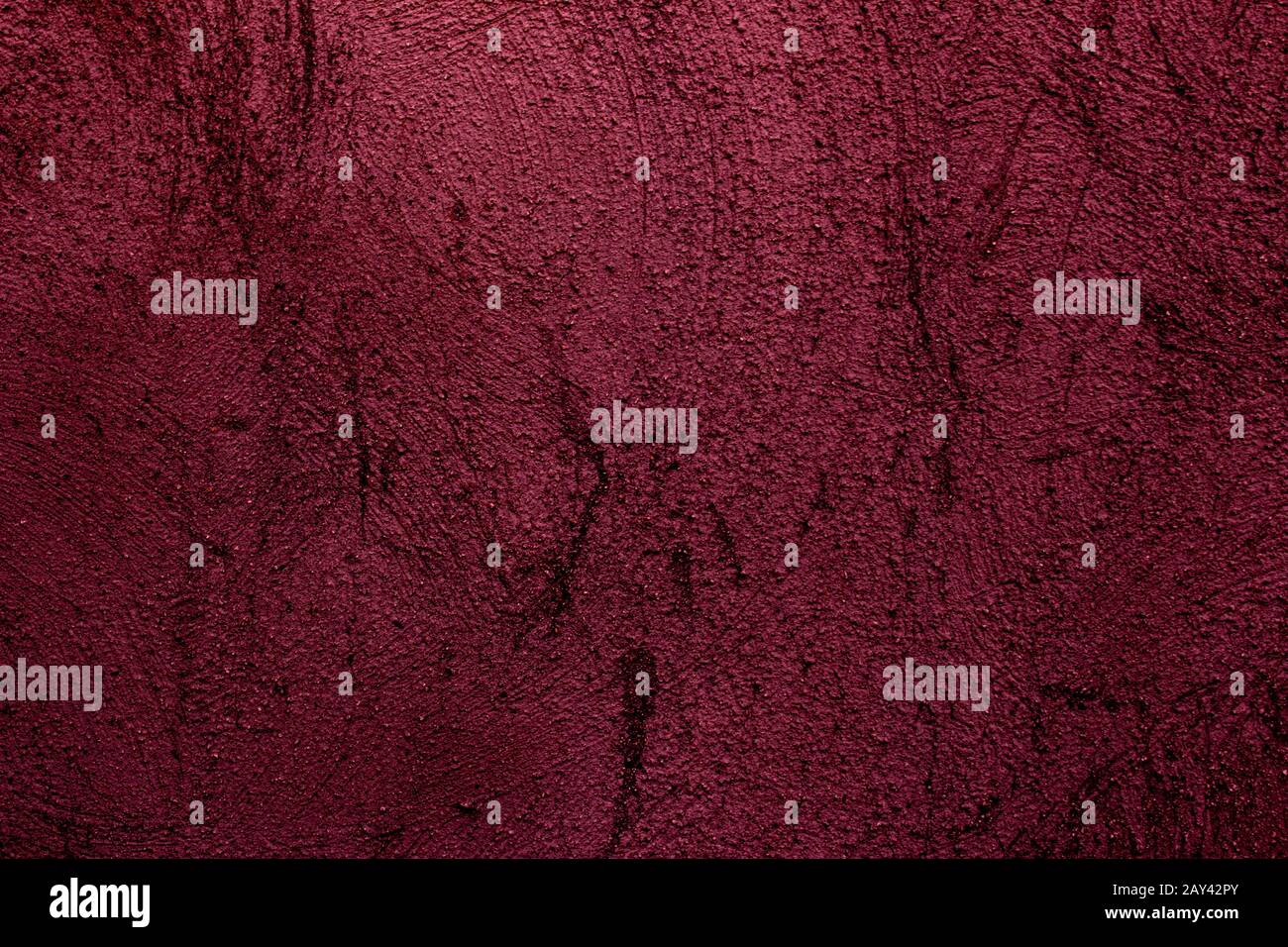 Crimson colored abstract wall background with textures of different ...