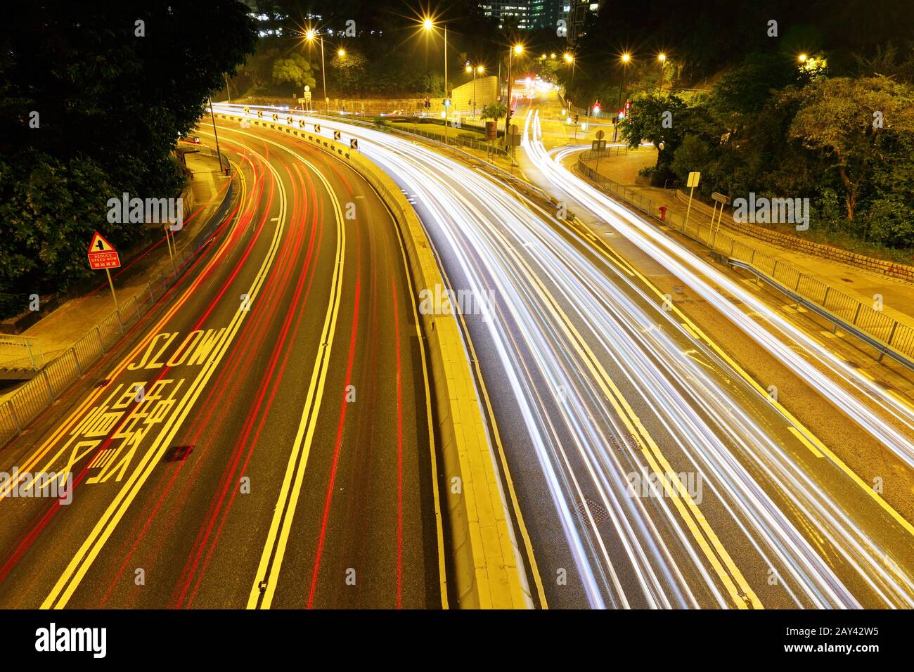 traffic downtown at night Stock Photo - Alamy