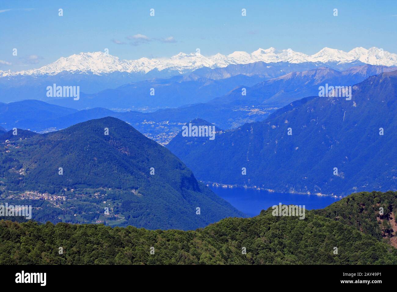 Mountains and snow on Lake Como Stock Photo - Alamy