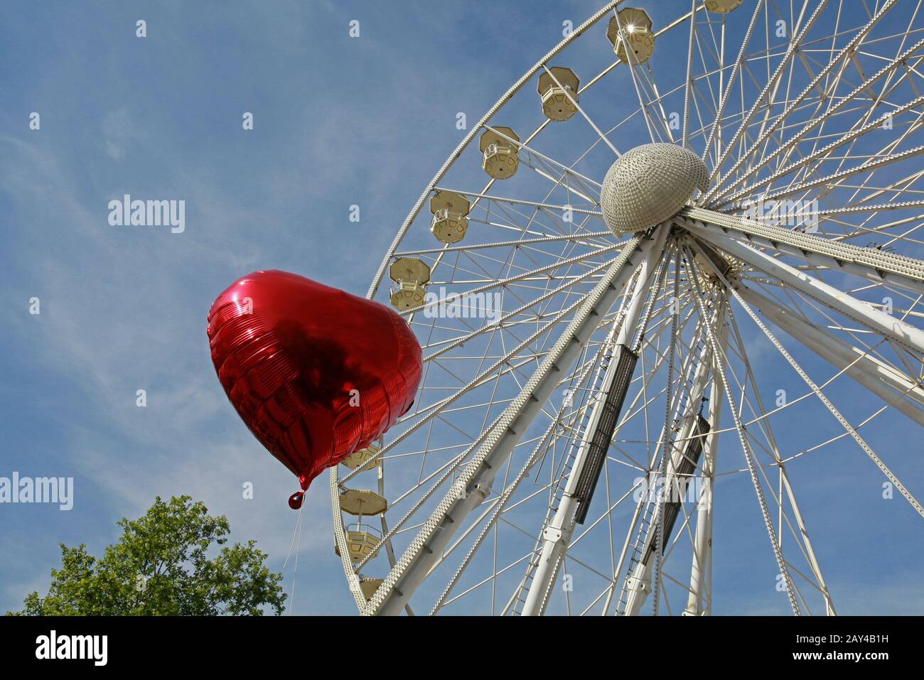 Ferris wheel and balloon Stock Photo - Alamy