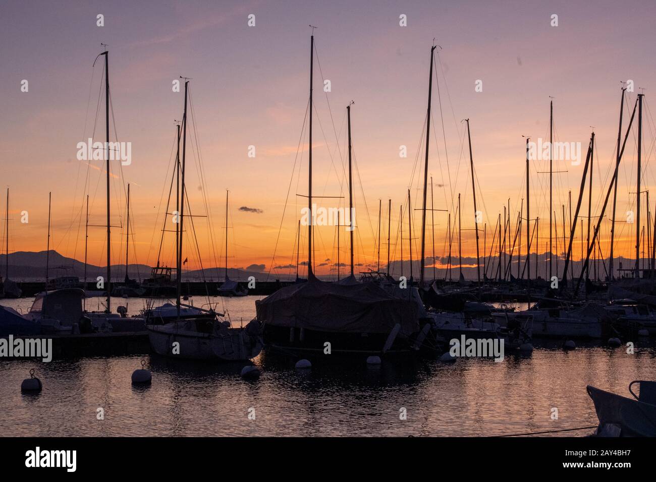 Boats in Pully Port on Lake Geneva in Switzerland at sunset Stock Photo ...