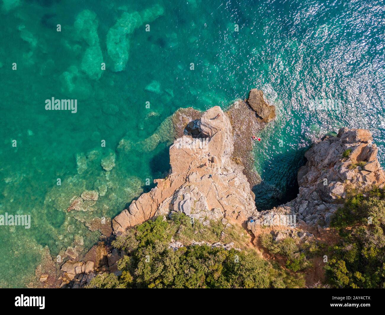 Aerial view of Mogren promontory between the Mogren beaches. Budva ...