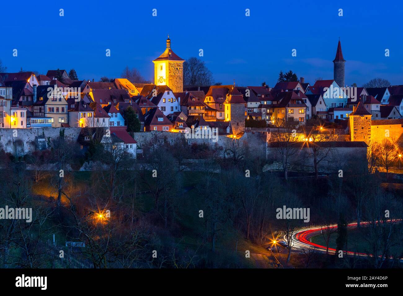 Night aerial view of roofs, towers and town wall in medieval Old Town ...