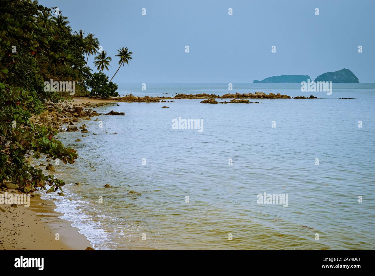 Sunset beach Thailand Chumphon area with palm trees Stock Photo - Alamy
